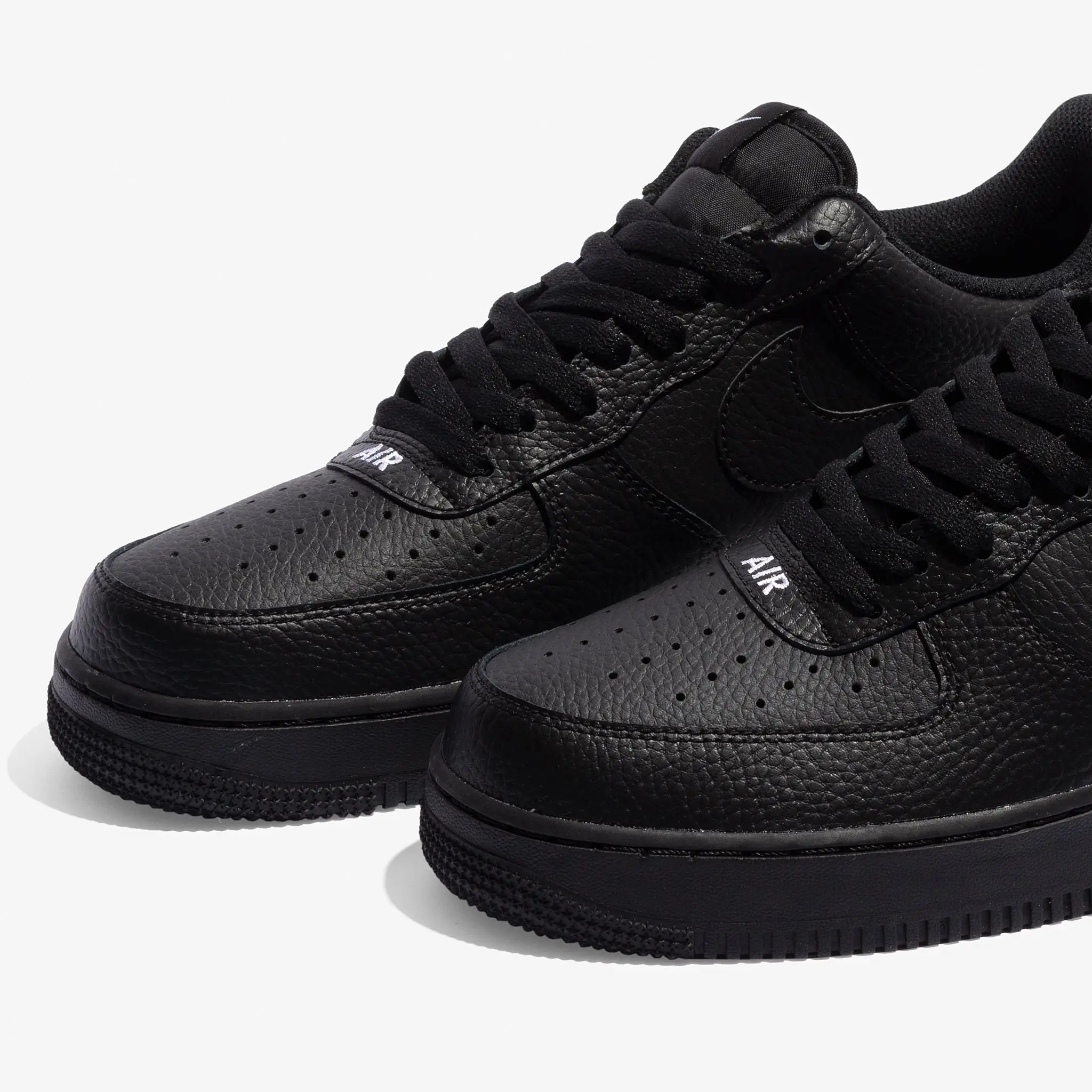 Nike Air Force 1 Stamp Logo Follows With A Triple Black Rendition | The ...