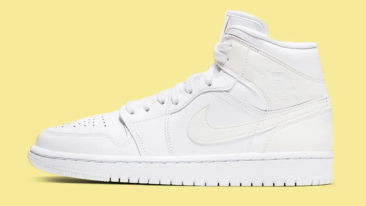 Step Out In Style In This Triple White Air Jordan 1 Mid | The Sole Supplier