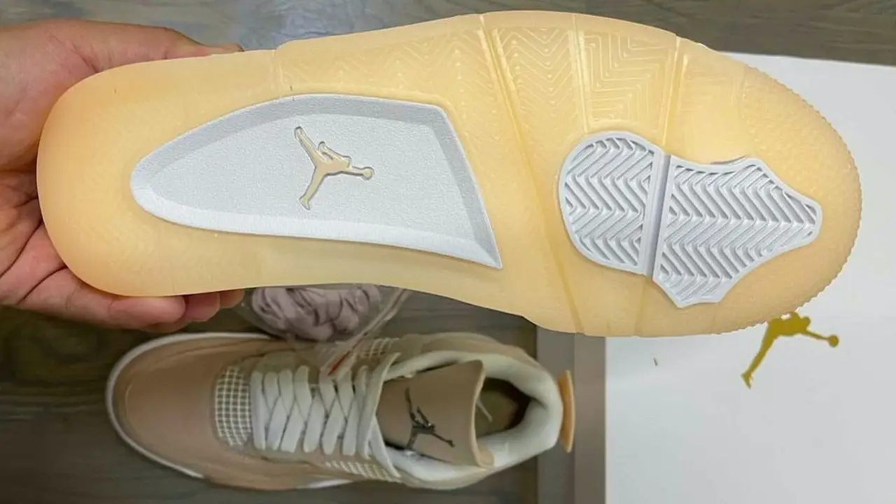 An In-Hand Look at the Air Jordan 4 "Shimmer" | The Sole Supplier