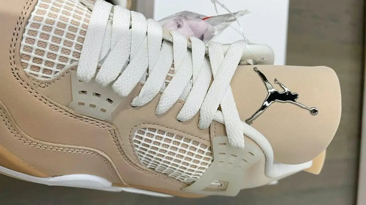 An In-Hand Look at the Air Jordan 4 "Shimmer" | The Sole Supplier
