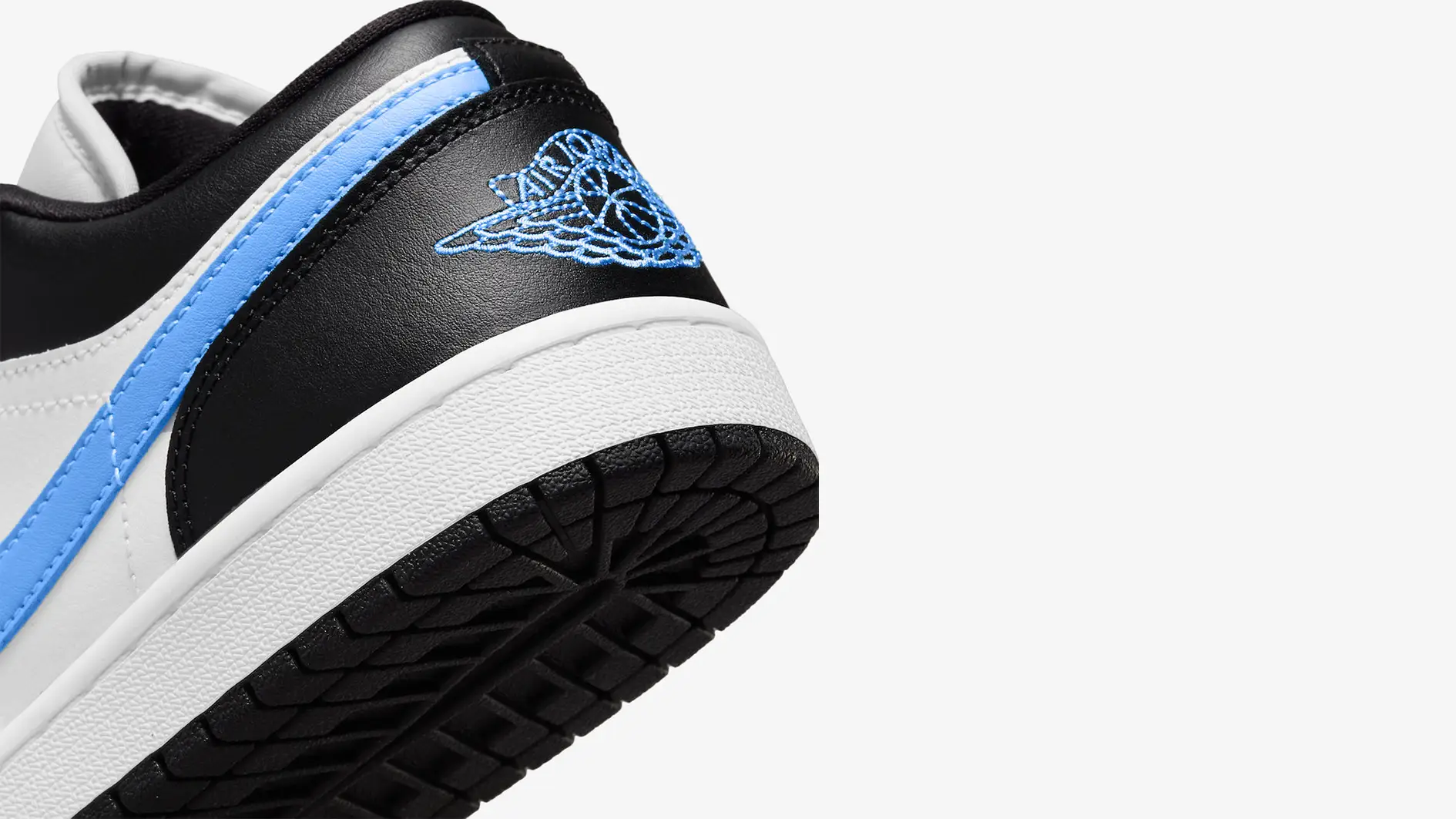 A 'University Blue' Swoosh Brightens This Air Jordan 1 Low | The Sole ...