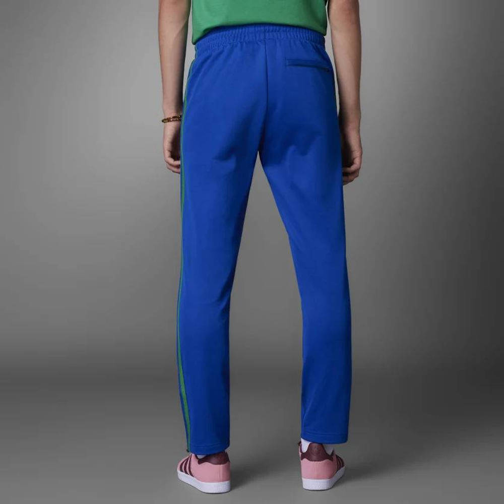 adidas Adicolor 70s Heritage Now Striped Tracksuit Bottoms - Collegiate ... adidas Adicolor 70s Heritage Now Striped Tracksuit Bottoms - Collegiate ...