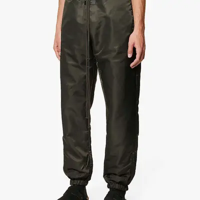 Fear of God ESSENTIALS Tapered Shell Jogging Bottoms | Where To Buy ...
