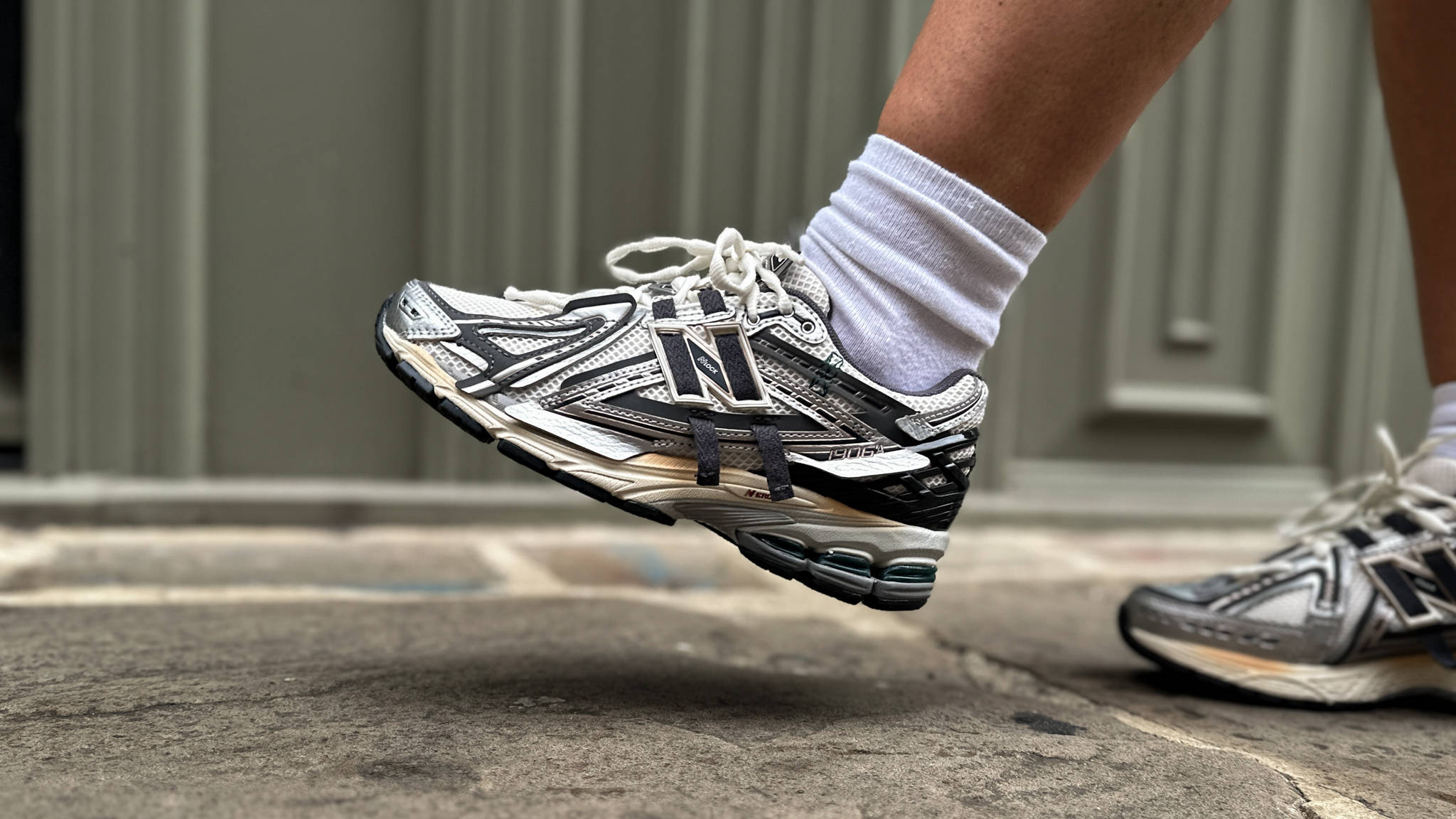 The Silver Lining: New Balance Embraces 2024's Metallic Sneaker Trend